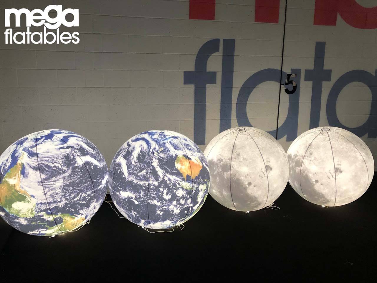 Inflatable planets – enquire about custom space inflatables