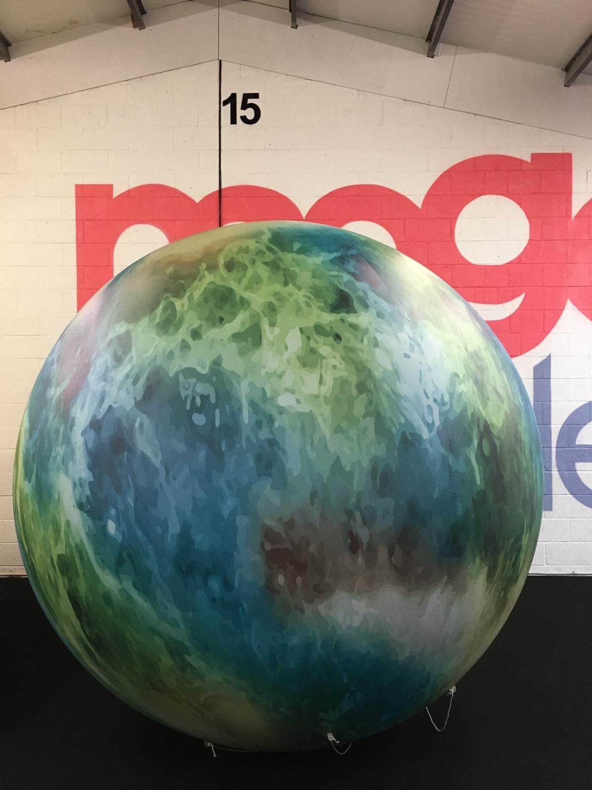 Inflatable planets – enquire about custom space inflatables